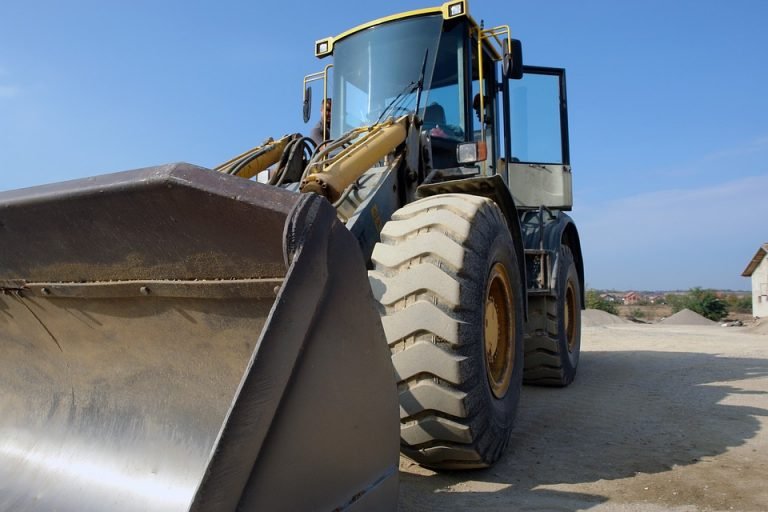 How a digger can be used to dig up rubbish